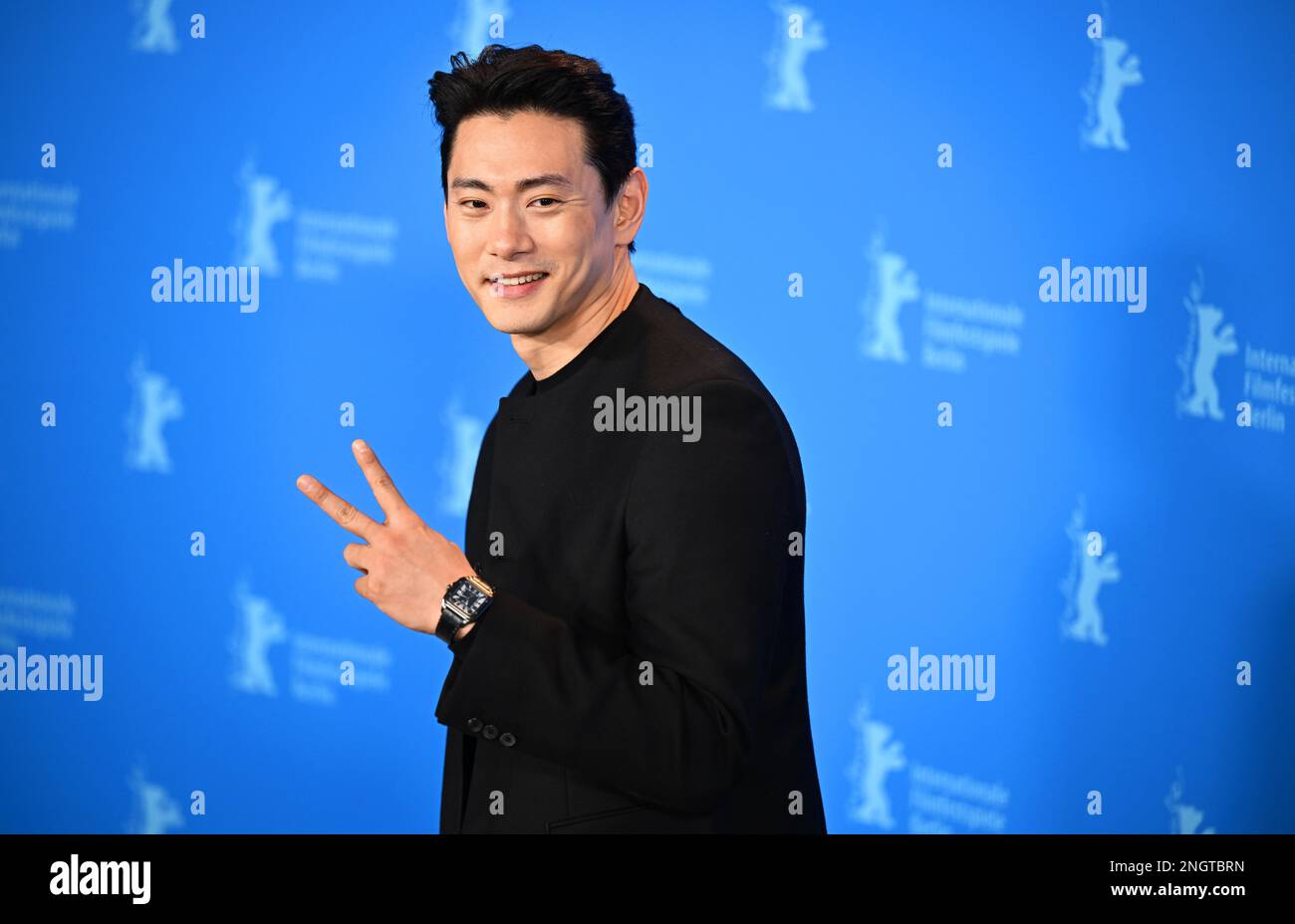 Berlin, Germany. 19th Feb, 2023. Teo Yoo, actor, stands in front of the ...