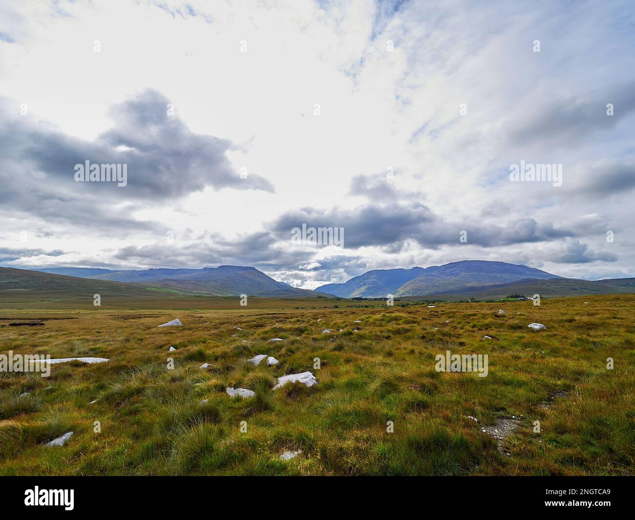 landscape of the lush and green Connemara National Park, a popular ...