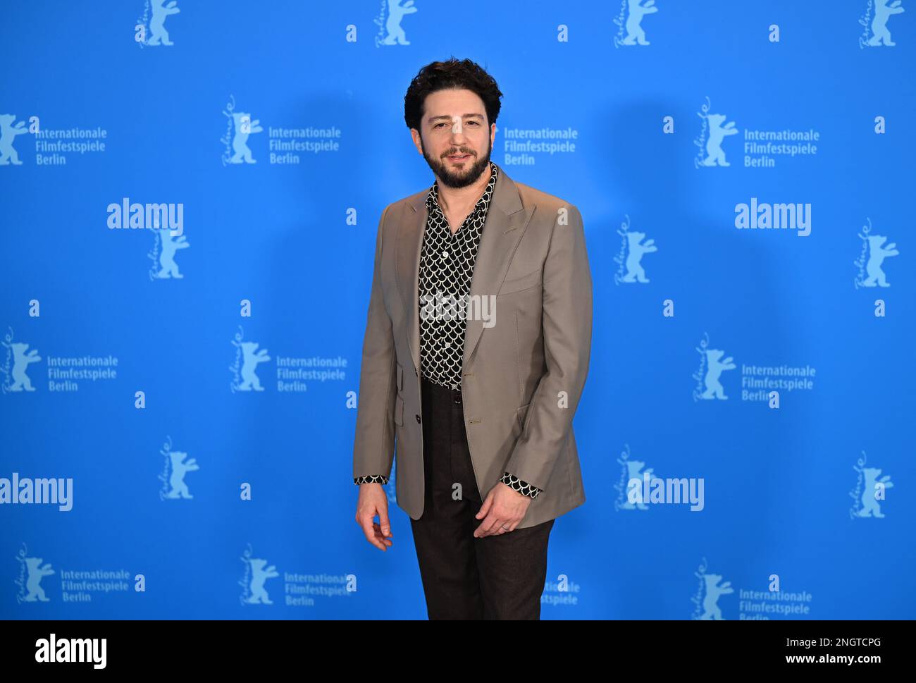 Berlin, Germany. 19th Feb, 2023. John Magaro, actor, stands in front of ...