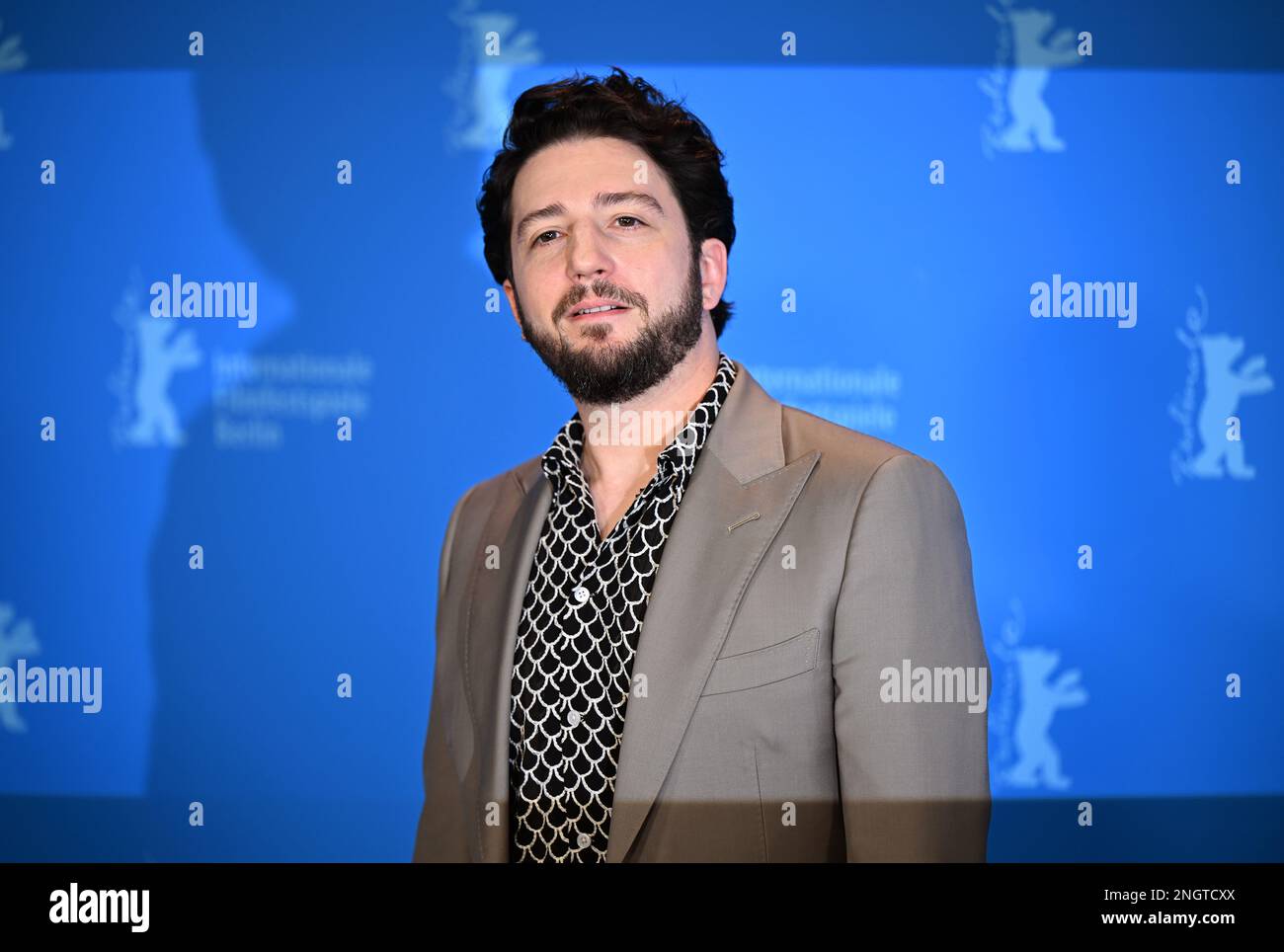 Berlin, Germany. 19th Feb, 2023. John Magaro, actor, stands in front of ...