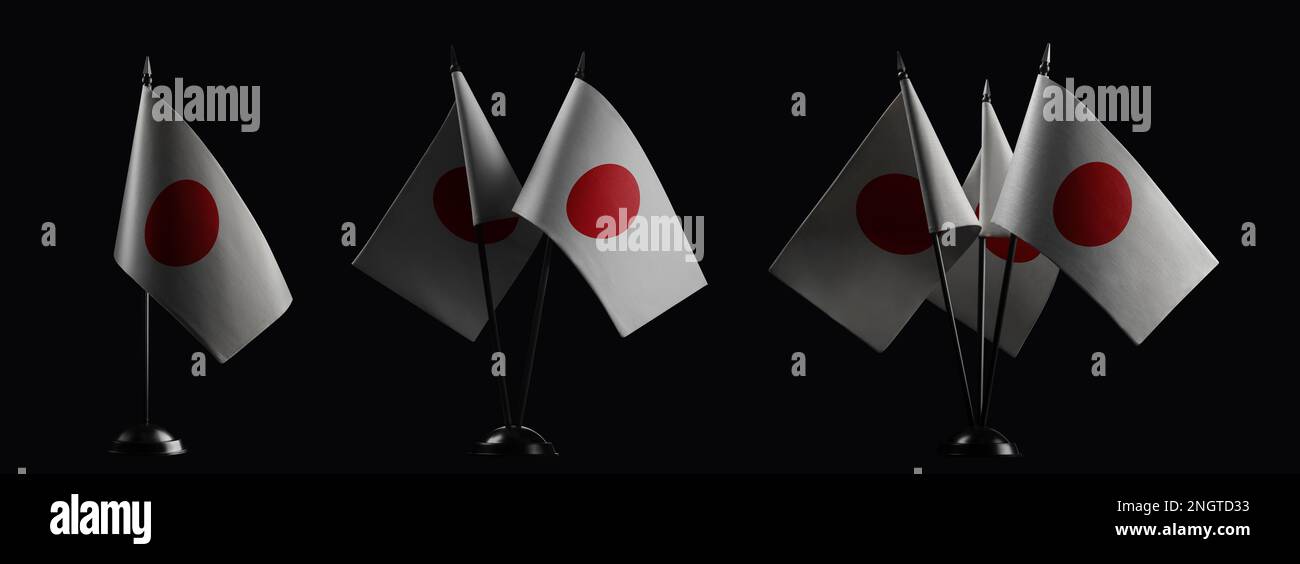 Small national flags of the Japan on a black background Stock Photo - Alamy