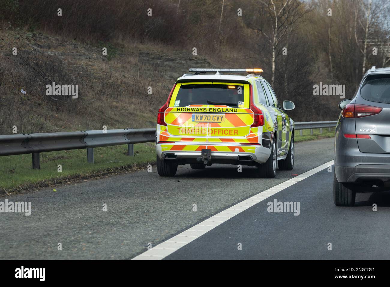 Highways England vehicle driving along motorway hard shoulder to attend ...