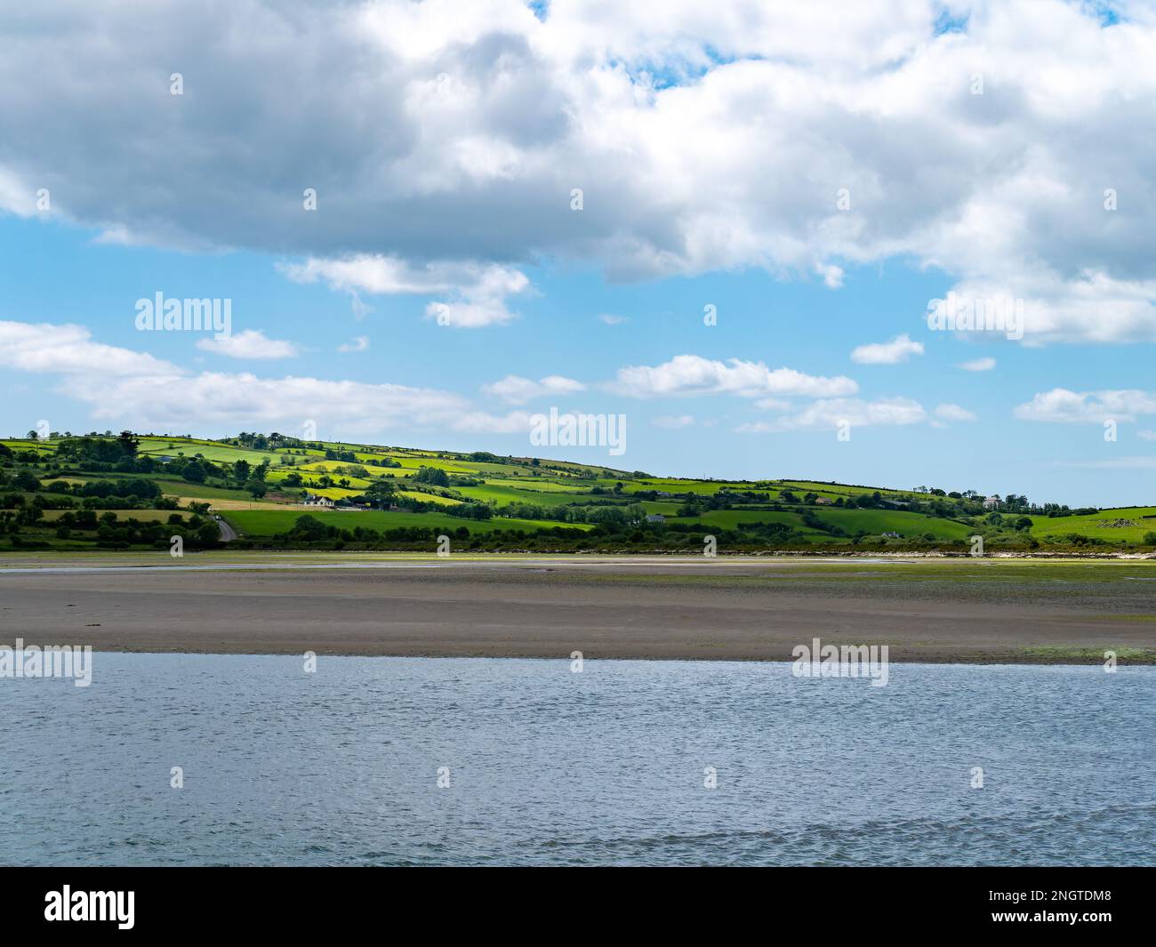 White clouds in the sky, countryside. Green hills on a nice summer day ...