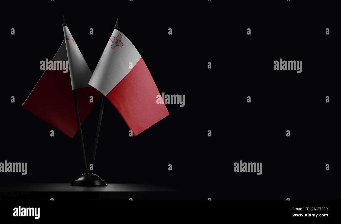 Small national flags of the Malta on a black background Stock Photo - Alamy