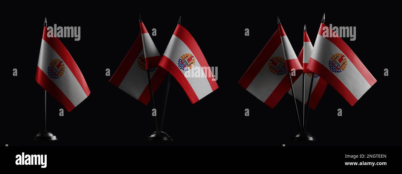 Small national flags of the French Polynesia on a black background ...