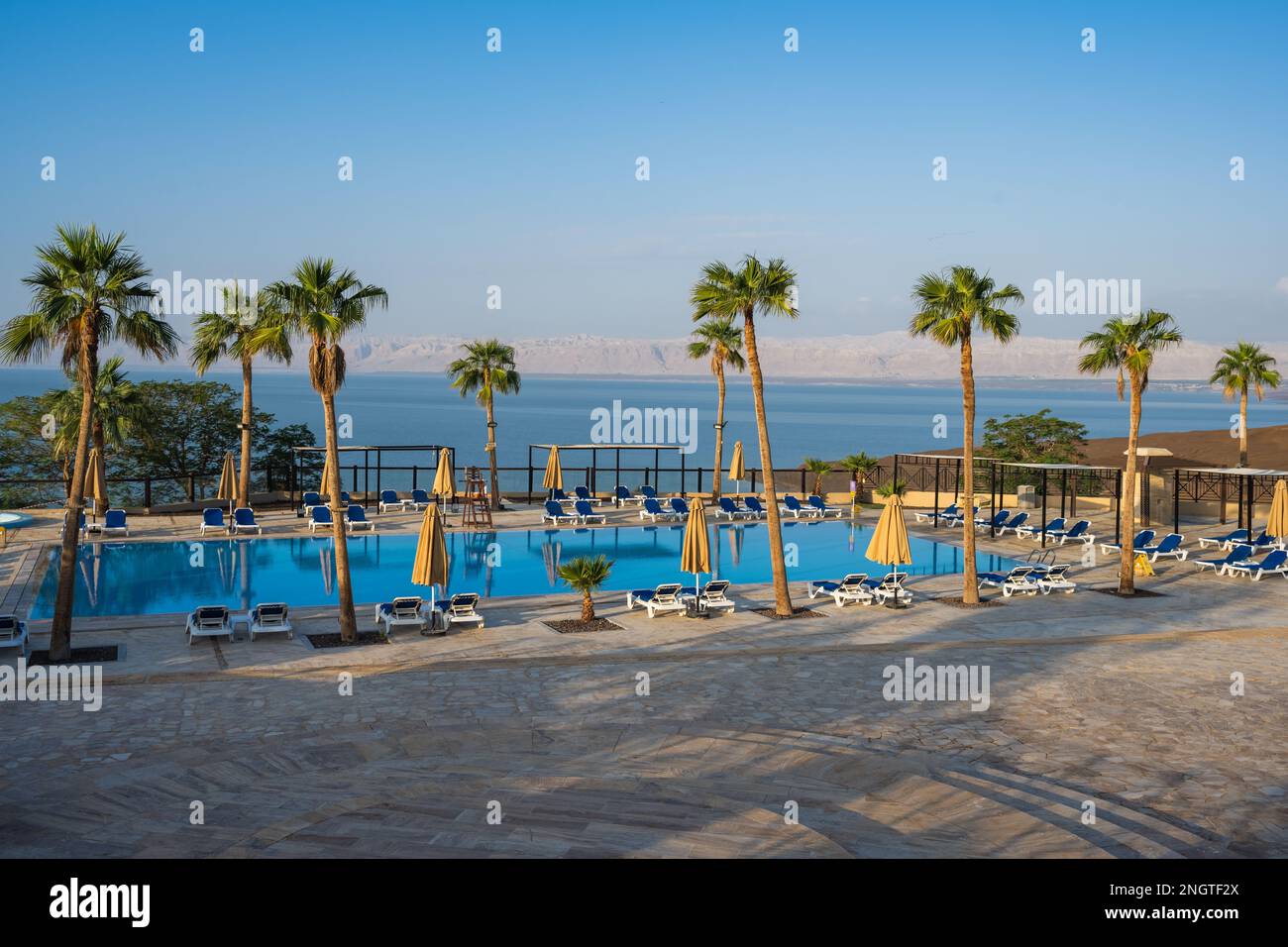 Dead Sea Beach Resort near Sweimeh, Jordan with Palm Trees and Swimming ...