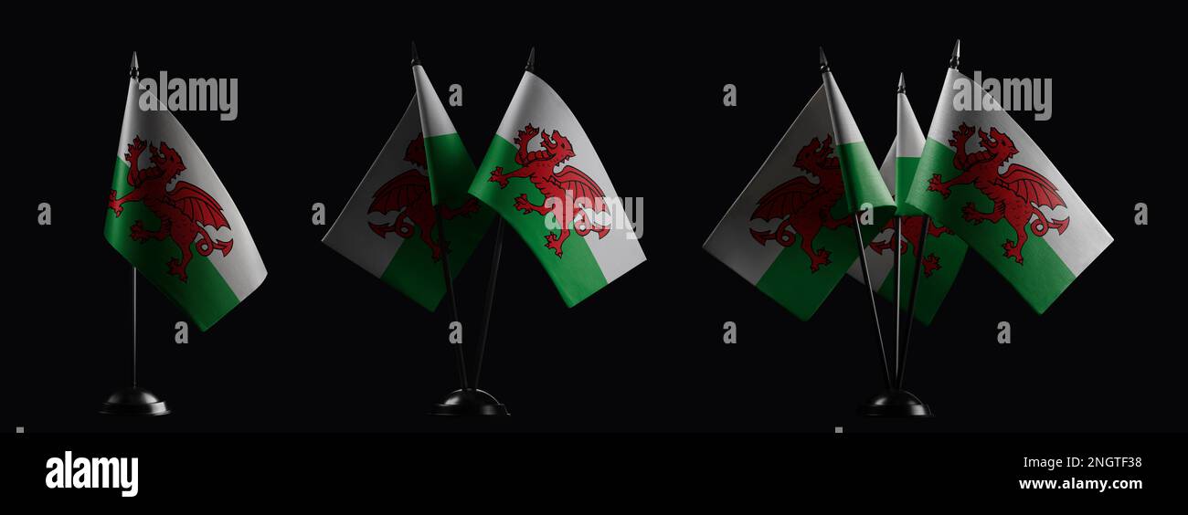 Small national flags of the Wales on a black background Stock Photo - Alamy