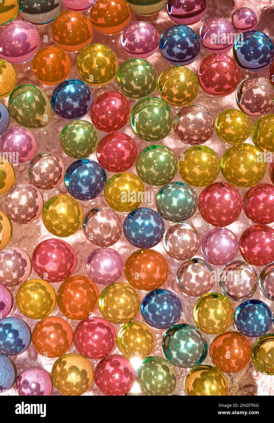 pink-colorful water balls decorations background, in balls reflection ...