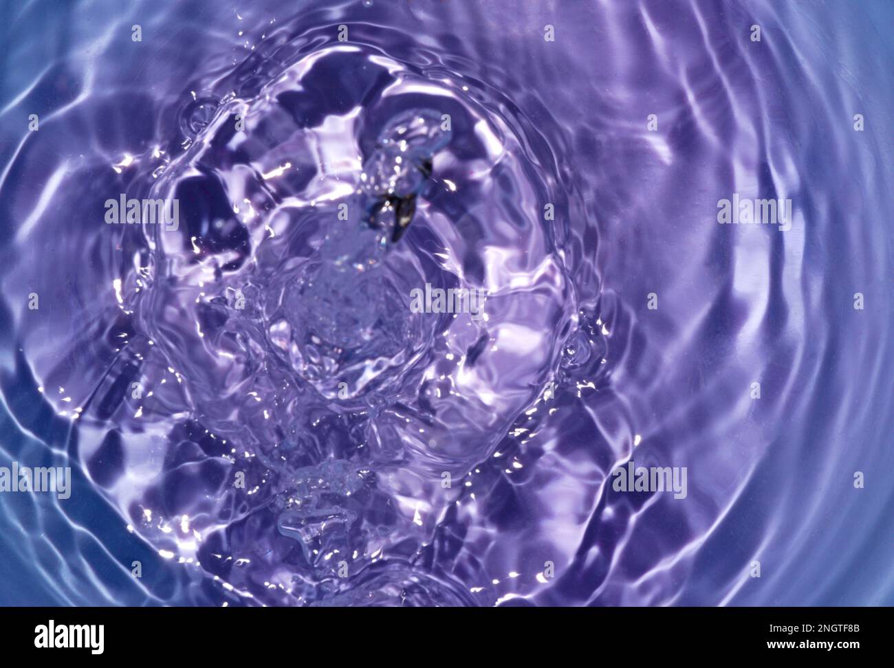 Purple water ripple abstract hi-res stock photography and images - Alamy