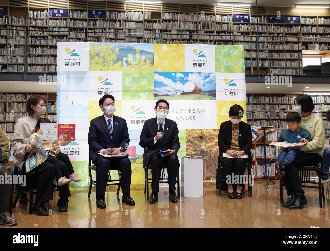 Japanese Prime Minister Fumio Kishida (C) participates in a talk event ...