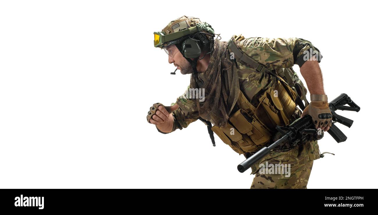 Side view of a running professional mercenary soldier. Photo isolated ...