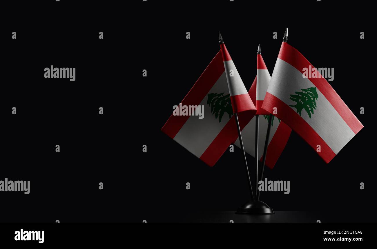 Small national flags of the Lebanon on a black background Stock Photo ...