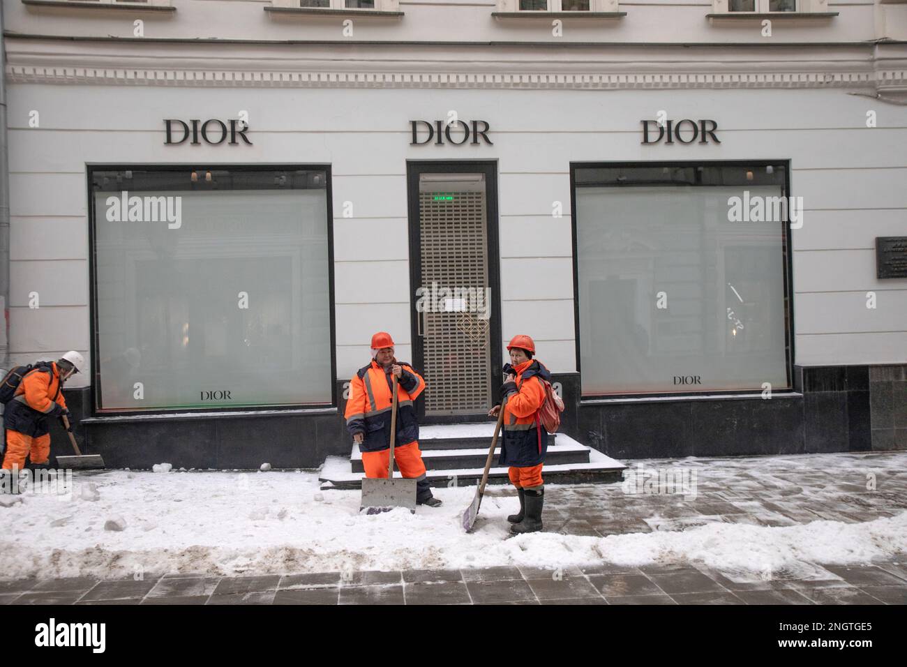 Moscow, Russia. 17th of February, 2023.Workers clean up a snow on a ...