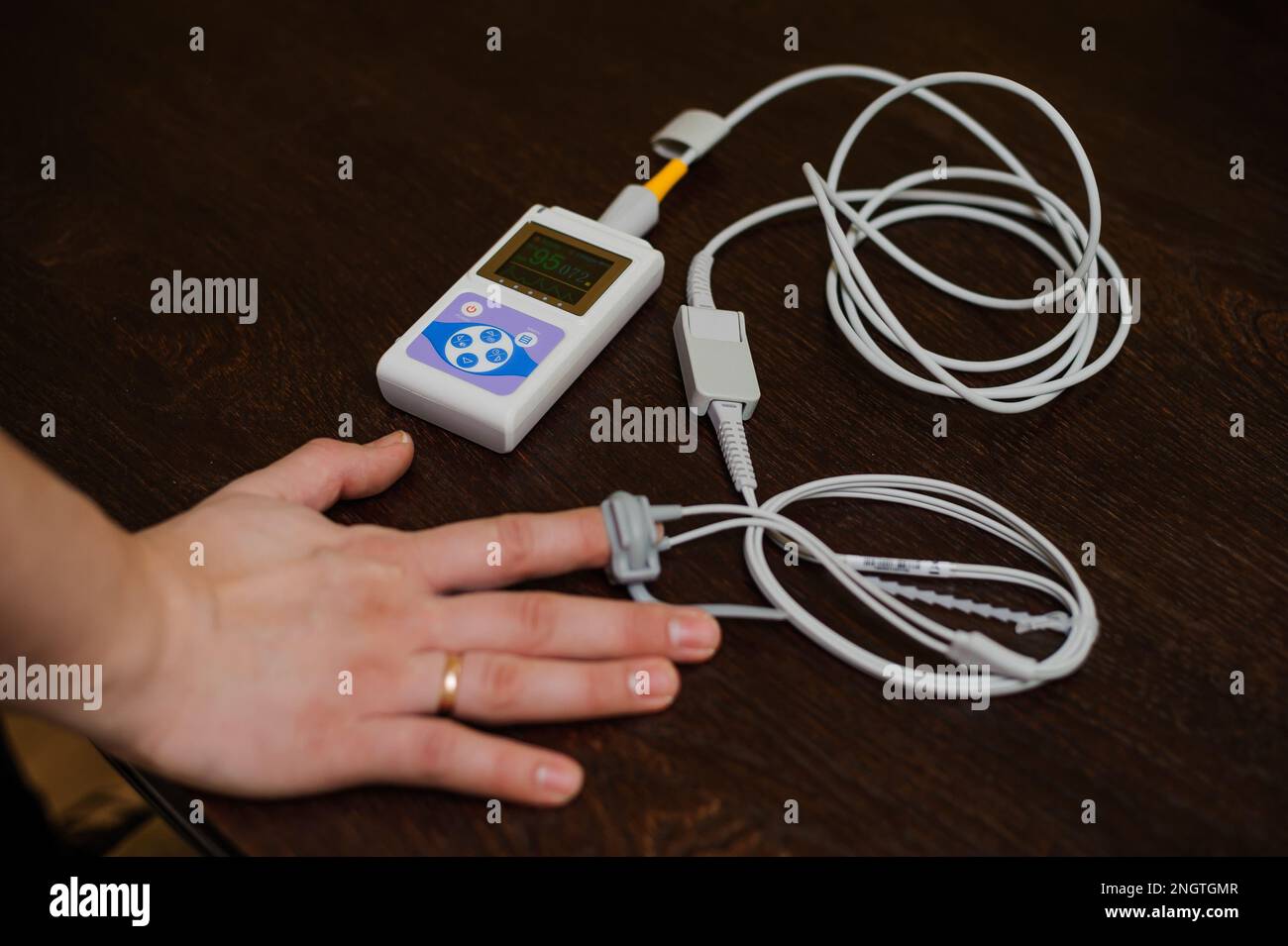 Man using pulse oximeter measures oxygen saturation level, health care ...