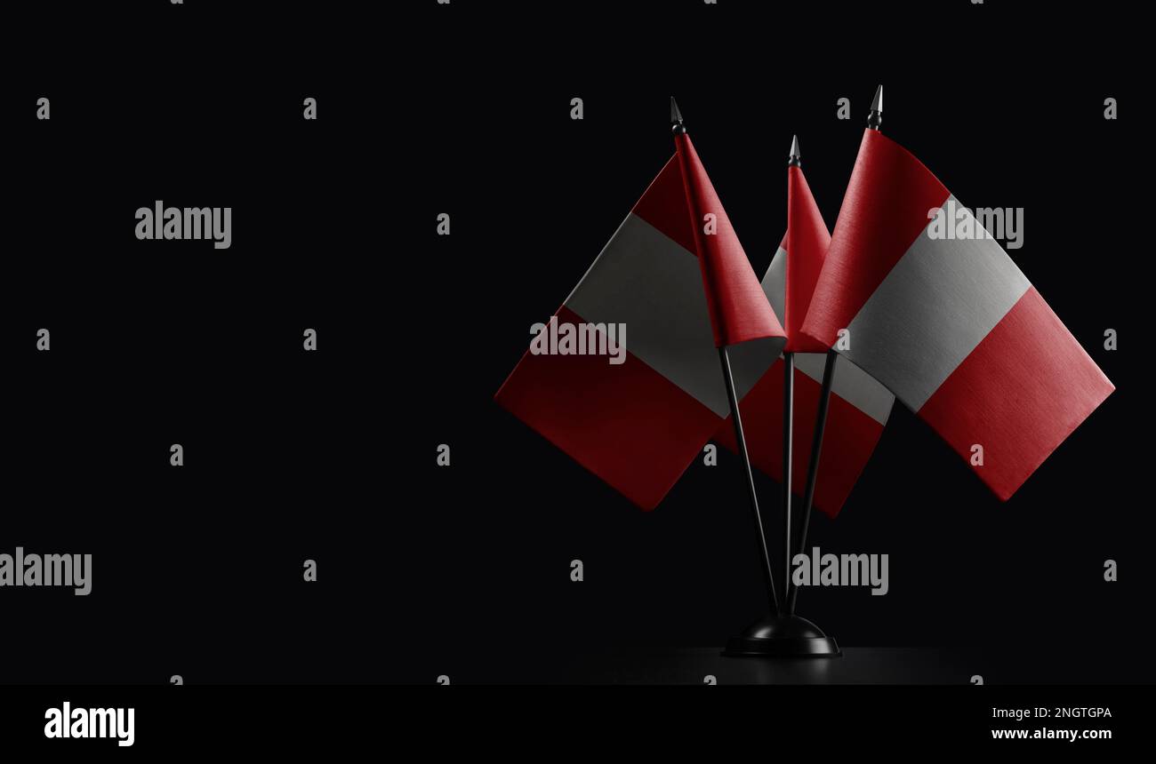 Small national flags of the Peru on a black background Stock Photo - Alamy