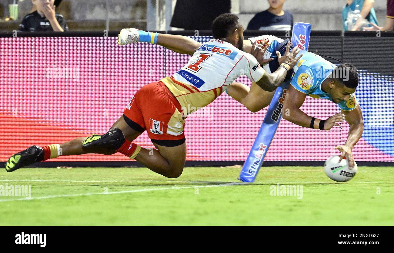 Alofiana Khan-Pereira (right) of the Titans scores a try despite the ...