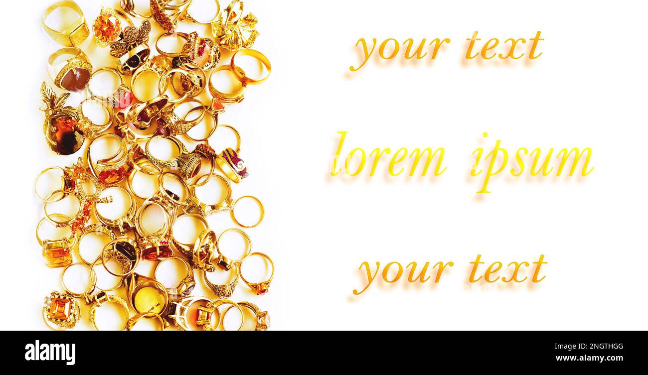 golden finger rings on white. visit card, banner Stock Photo - Alamy