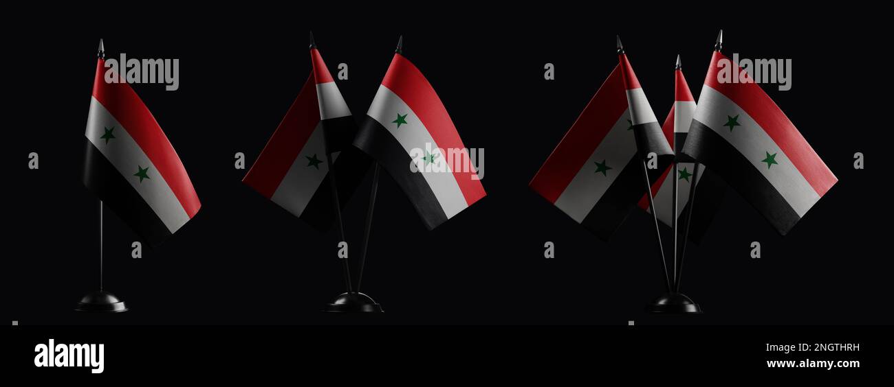 Small national flags of the Syria on a black background Stock Photo - Alamy