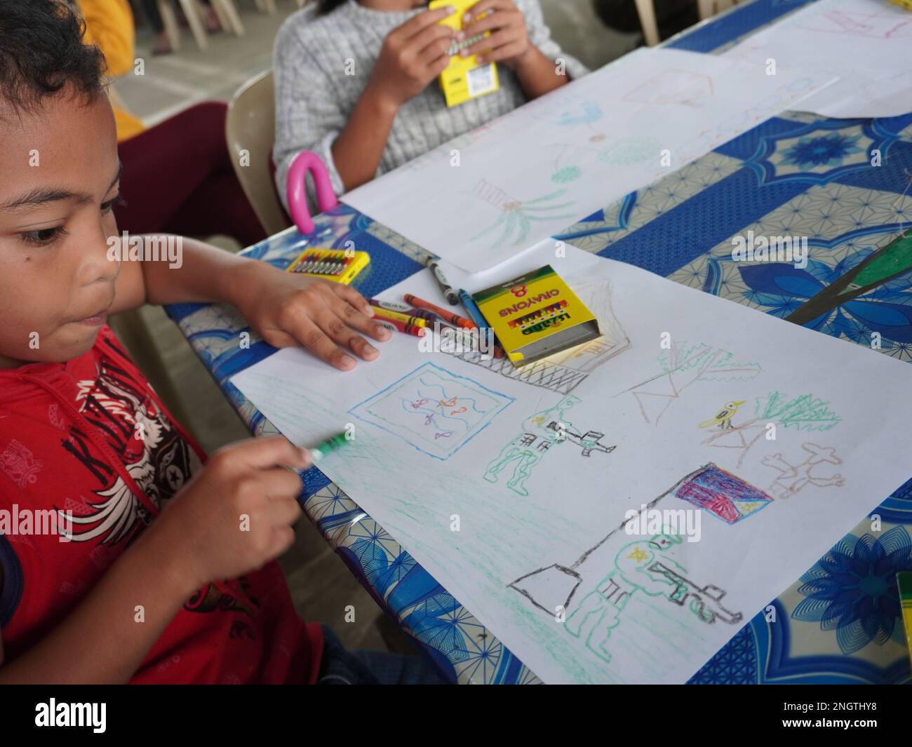 Palapag, Philippines. 19th February, 2023. While the parents of the ...