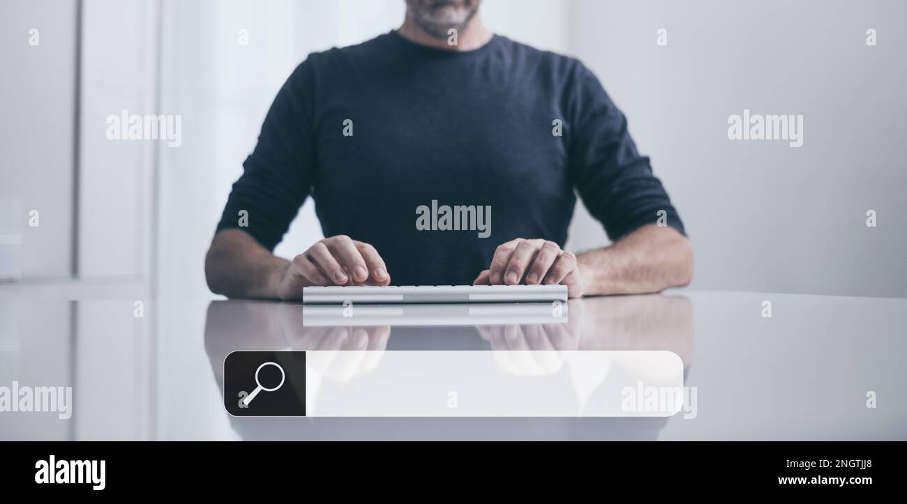 Man behind computer do search online. Find Internet informations ...