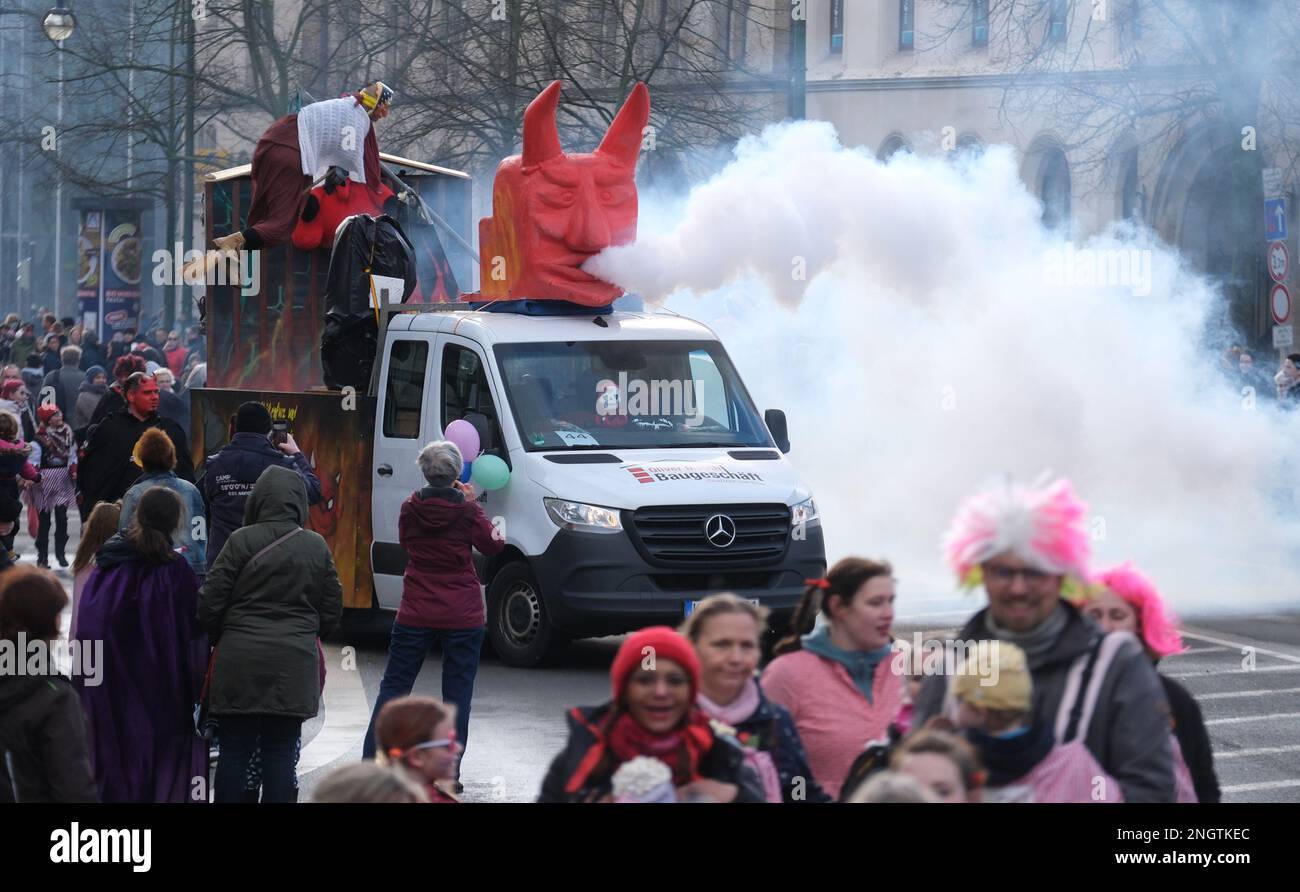 19 February 2023, Saxony-Anhalt, Dessau-Roßlau: A float with a smoking ...