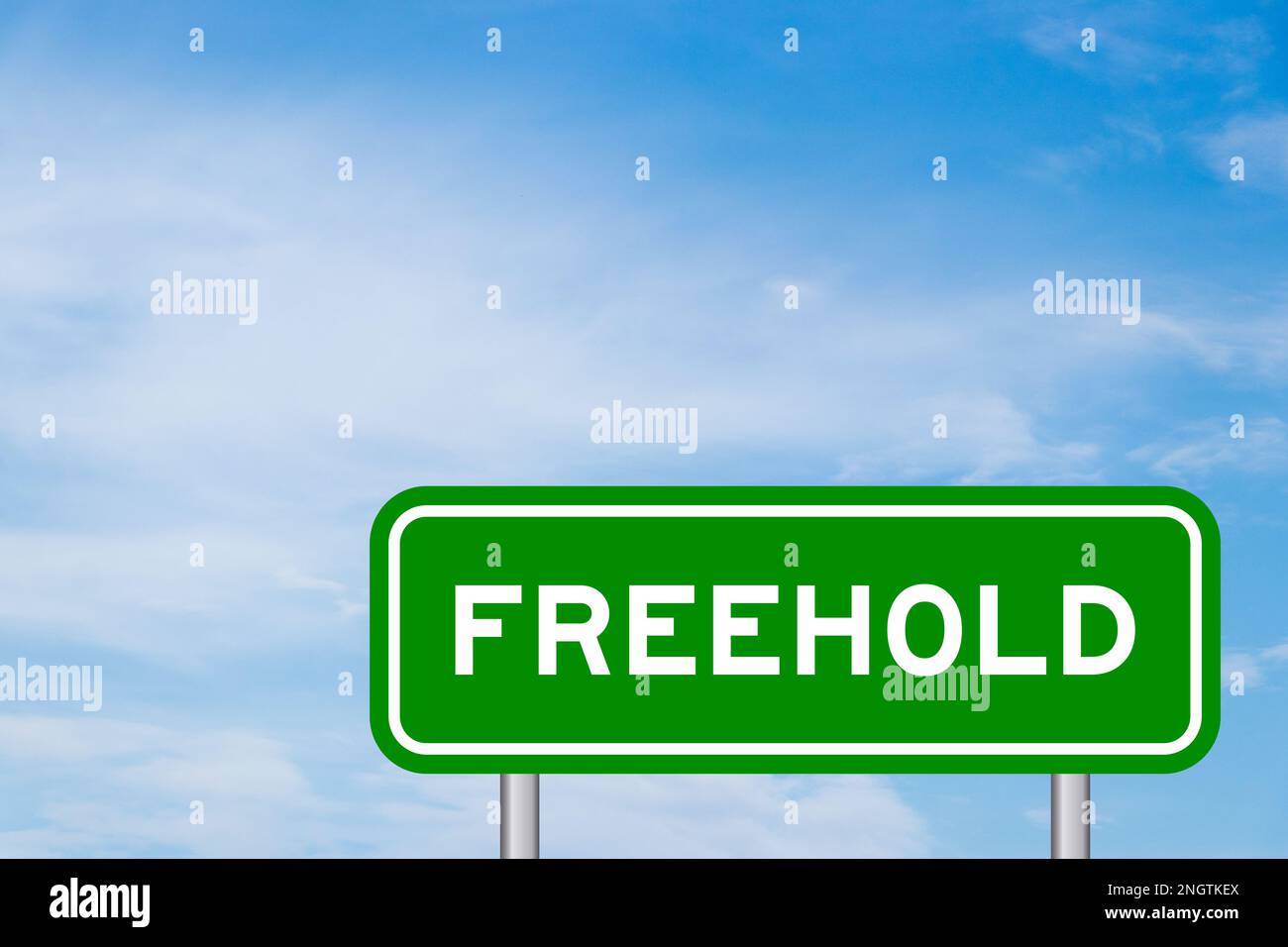 Green color transportation sign with word freehold on blue sky with ...