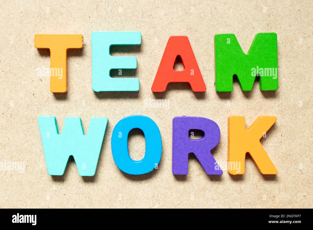 Color alphabet letter in word teamwork on wood background Stock Photo ...