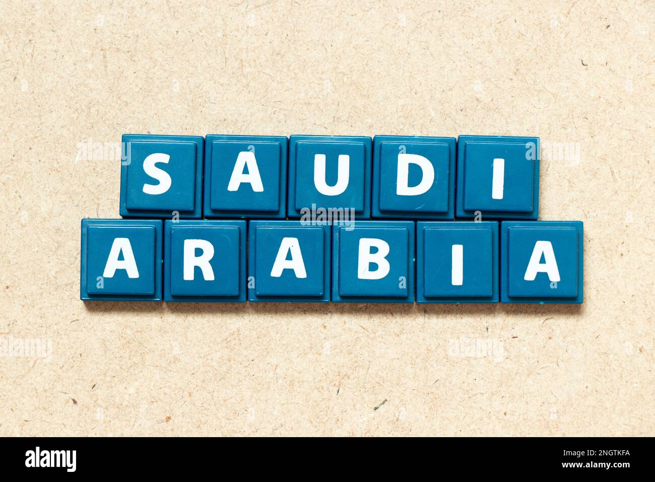 Tile alphabet letter in word saudi arabia on wood background Stock ...