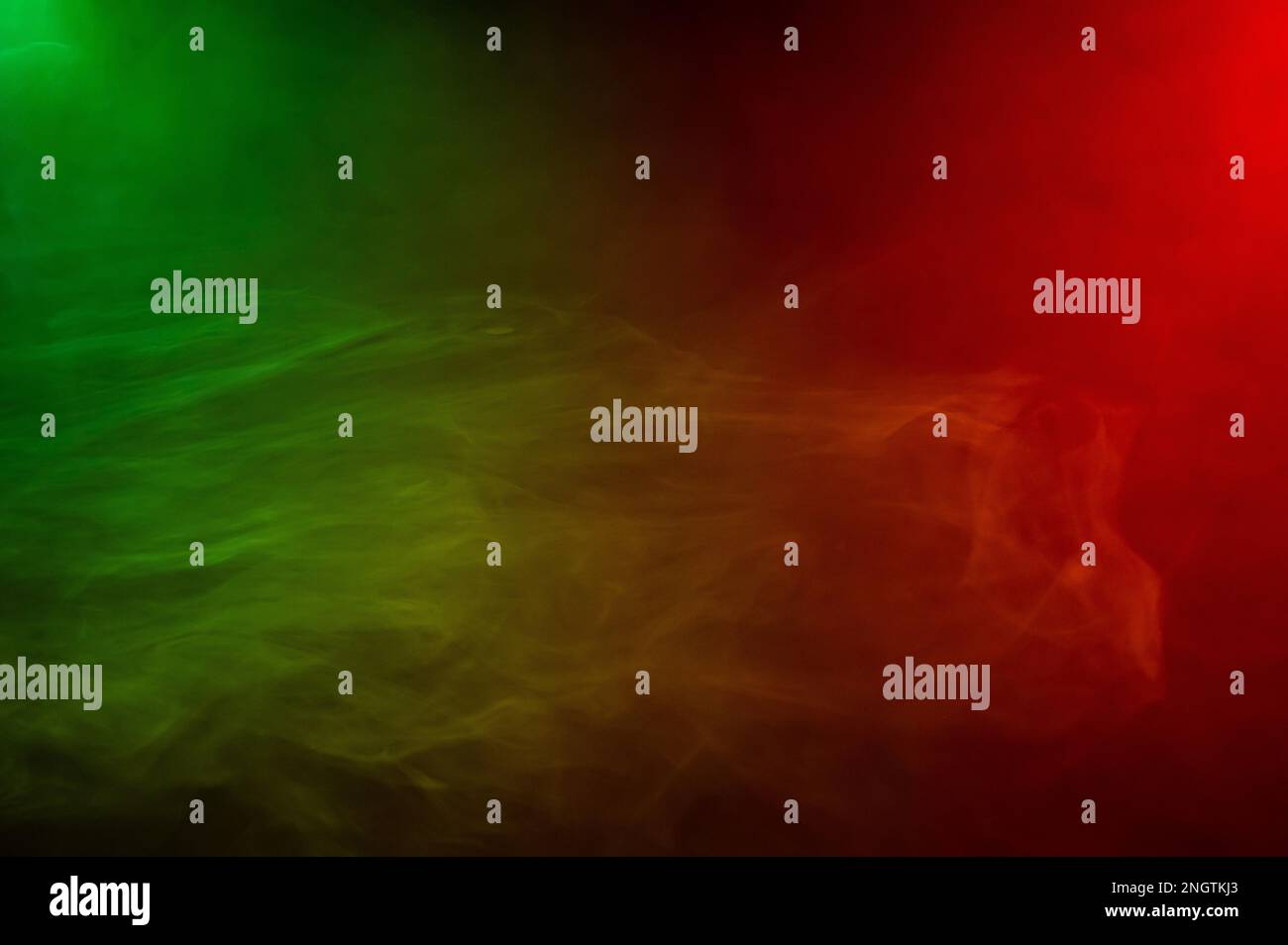 Red yellow green smoke on a black background Stock Photo - Alamy