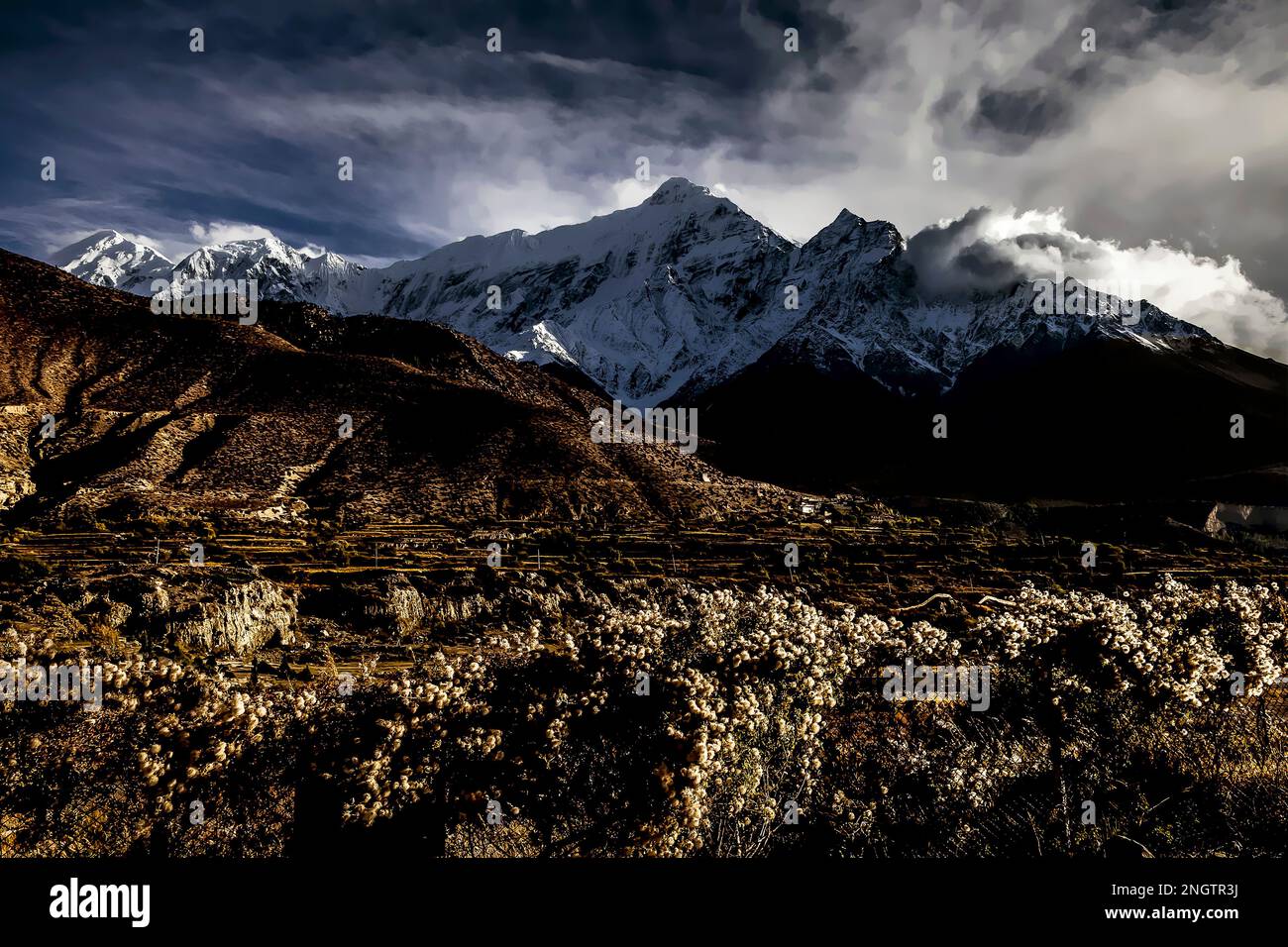 Nilgiri peak, view from Jomsom village. Annapurna circuit trek. Mustang ...