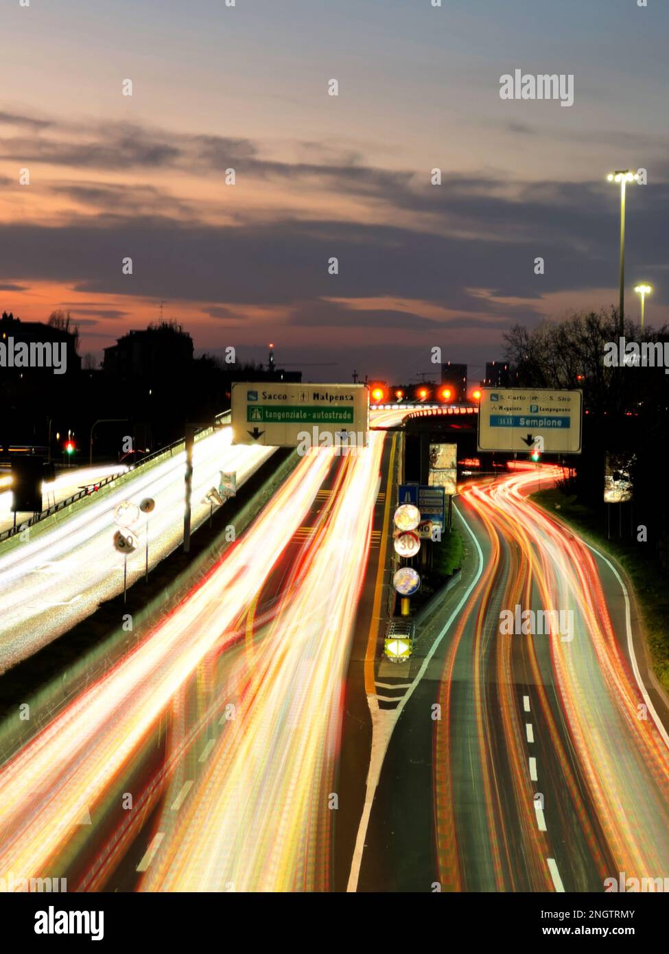 a fantastic image of Milan's motorway at sunset Stock Photo - Alamy
