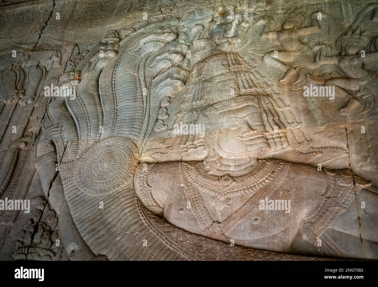 detail of bas relief stone carvings in sandstone on the walls of the ...