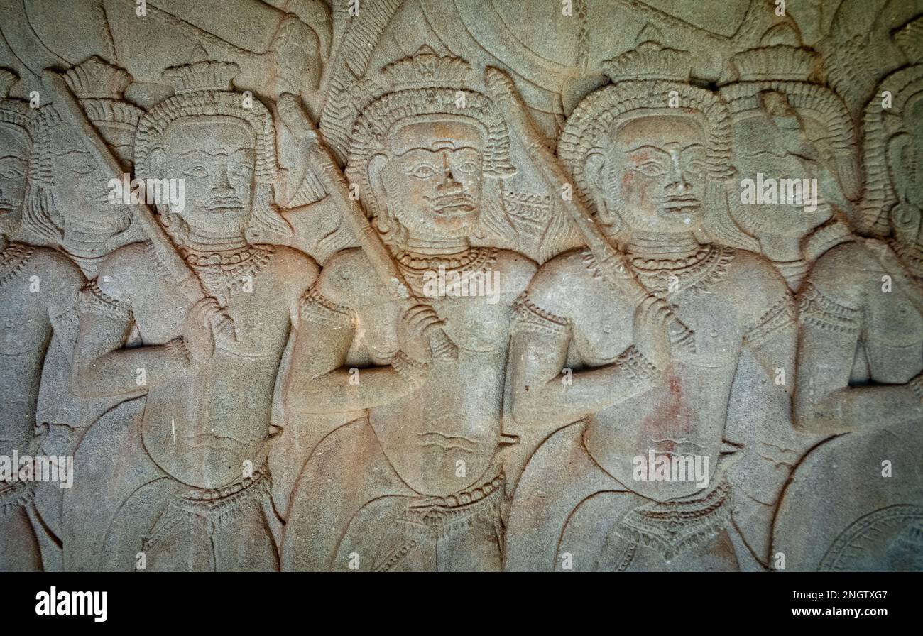 detail of bas relief stone carvings in sandstone on the walls of the ...