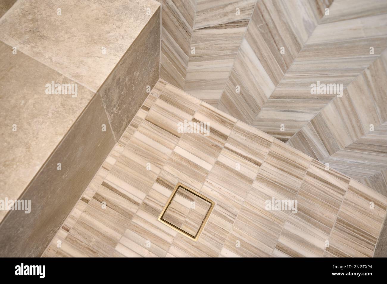 Detail of tile wall, bench and floor in a contemporary shower Stock ...