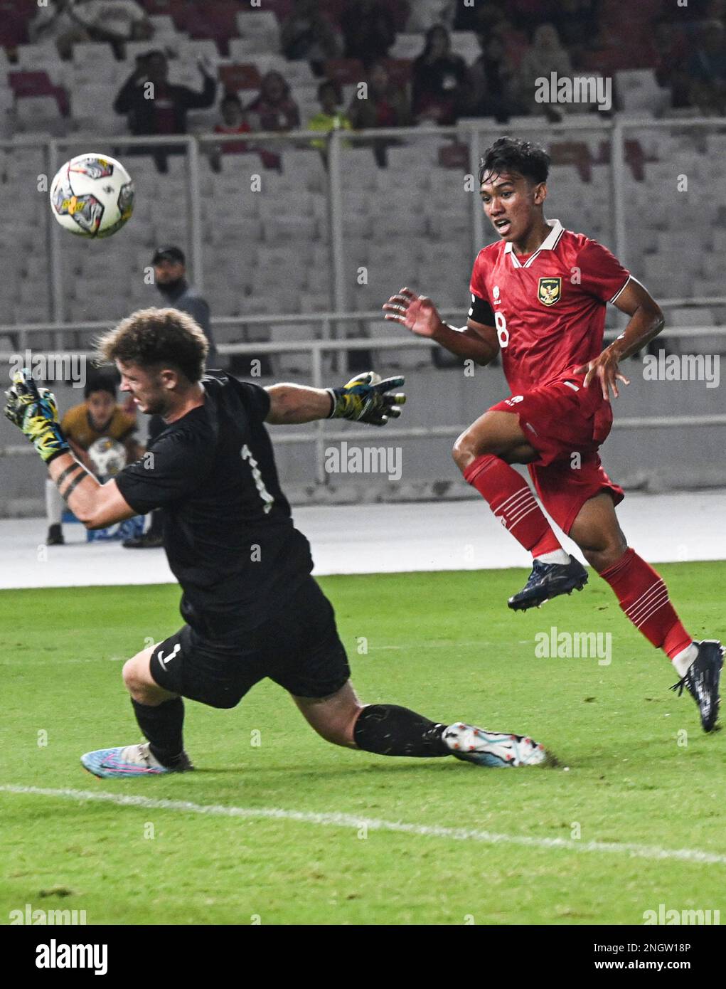 Jakarta, Indonesia. 19th Feb, 2023. Arkhan Fikri (R) of Indonesia vies ...