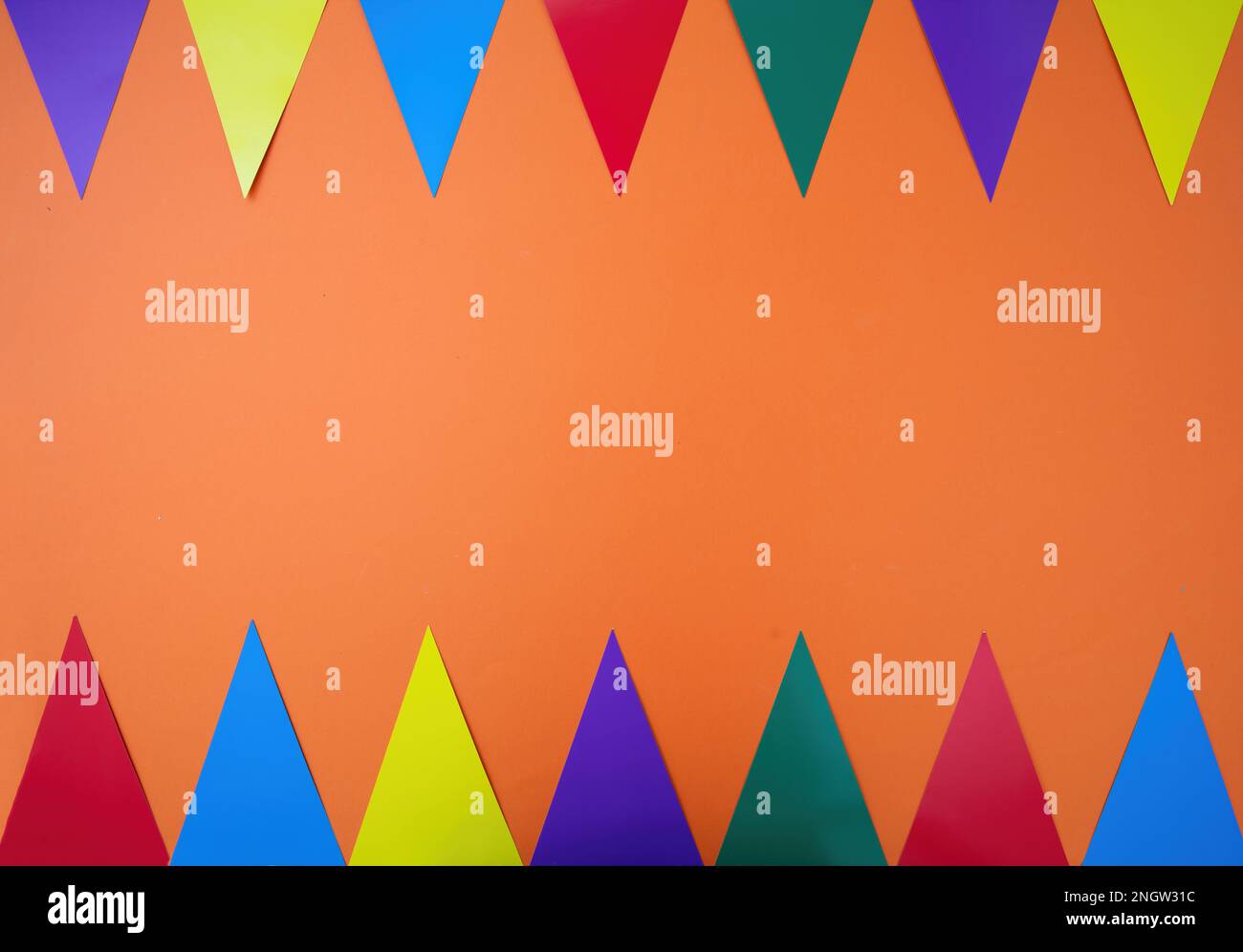 Carnival party, garland, colorful triangle flag as frame on orange ...