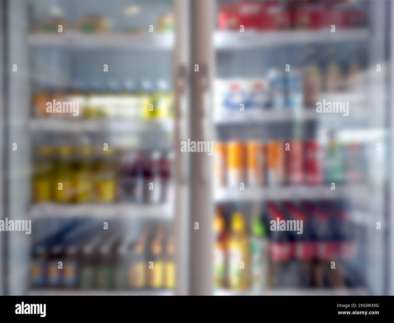 Abstract blur of freezer with many kind of drinks inside in supermarket ...