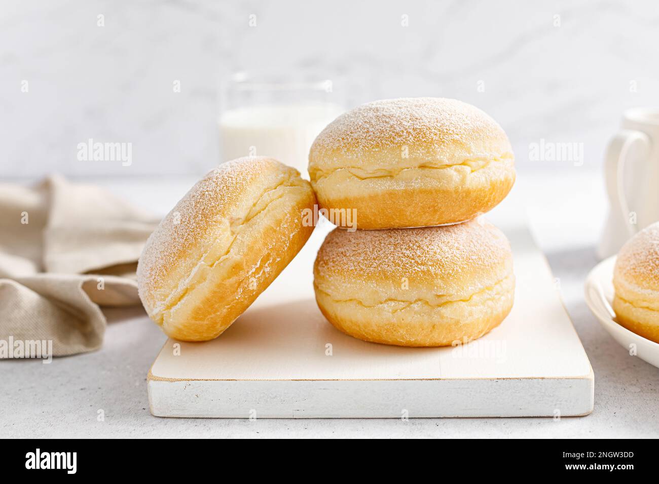 Berliner donut. Traditional german donut with raspberry jam, dusted ...