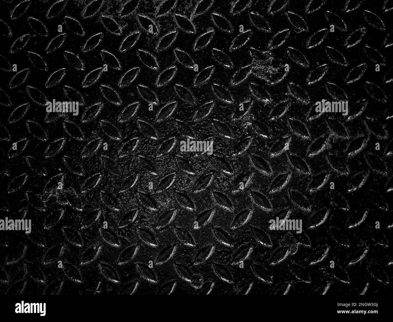 Blank space on black metallic checker plate anti-slip texture ...