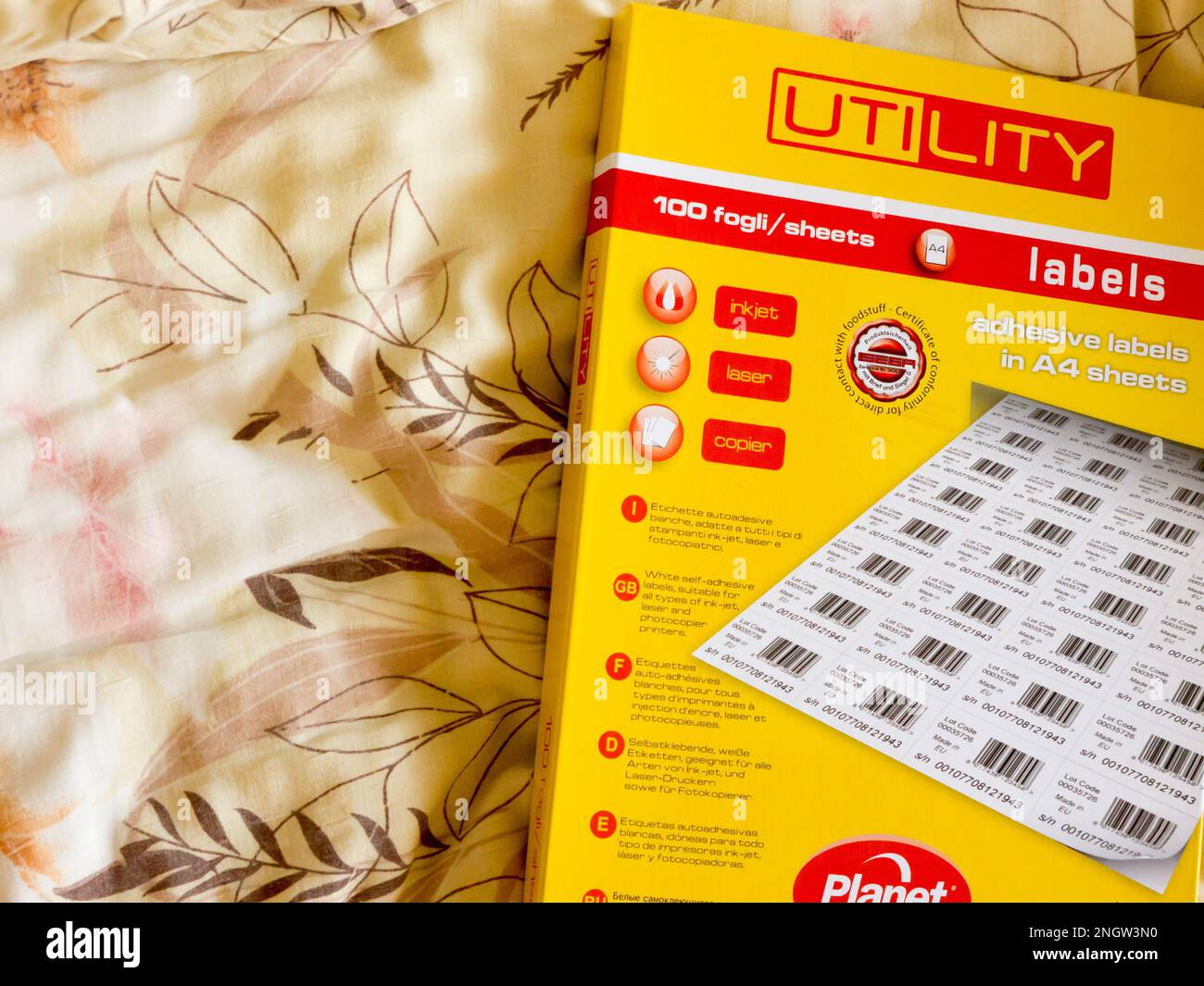 PLANET Utility White self-adhesive labels Stock Photo - Alamy