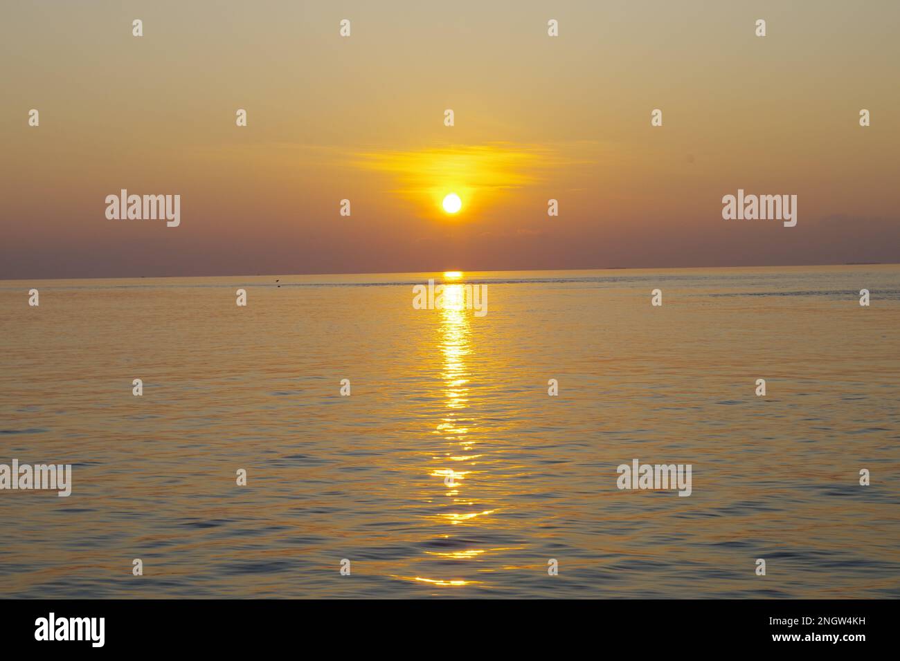 Sun setting at Helengeli, Maldives Stock Photo - Alamy