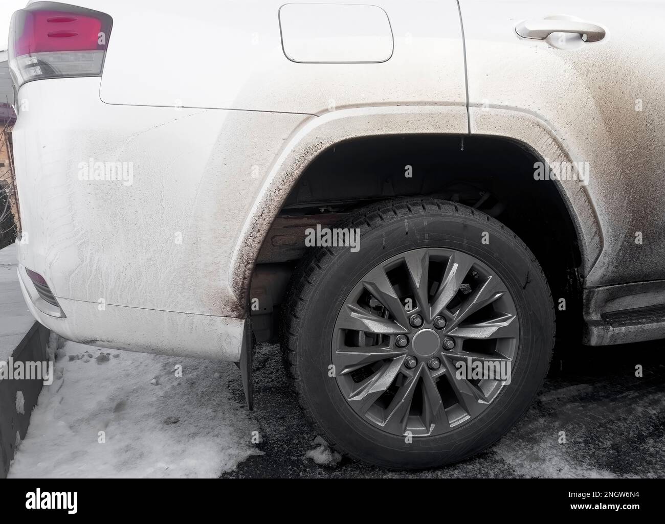 Side view of a very dirty car. Fragment of a dirty SUV. Dirty ...