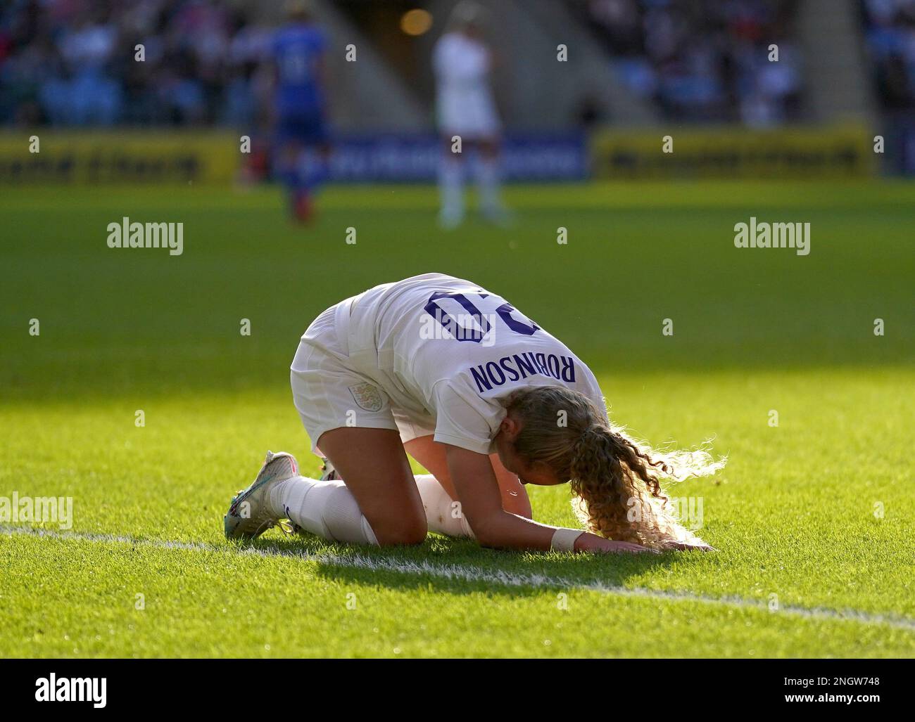 England's Katie Robinson reacts after missing the ball whilst trying to ...