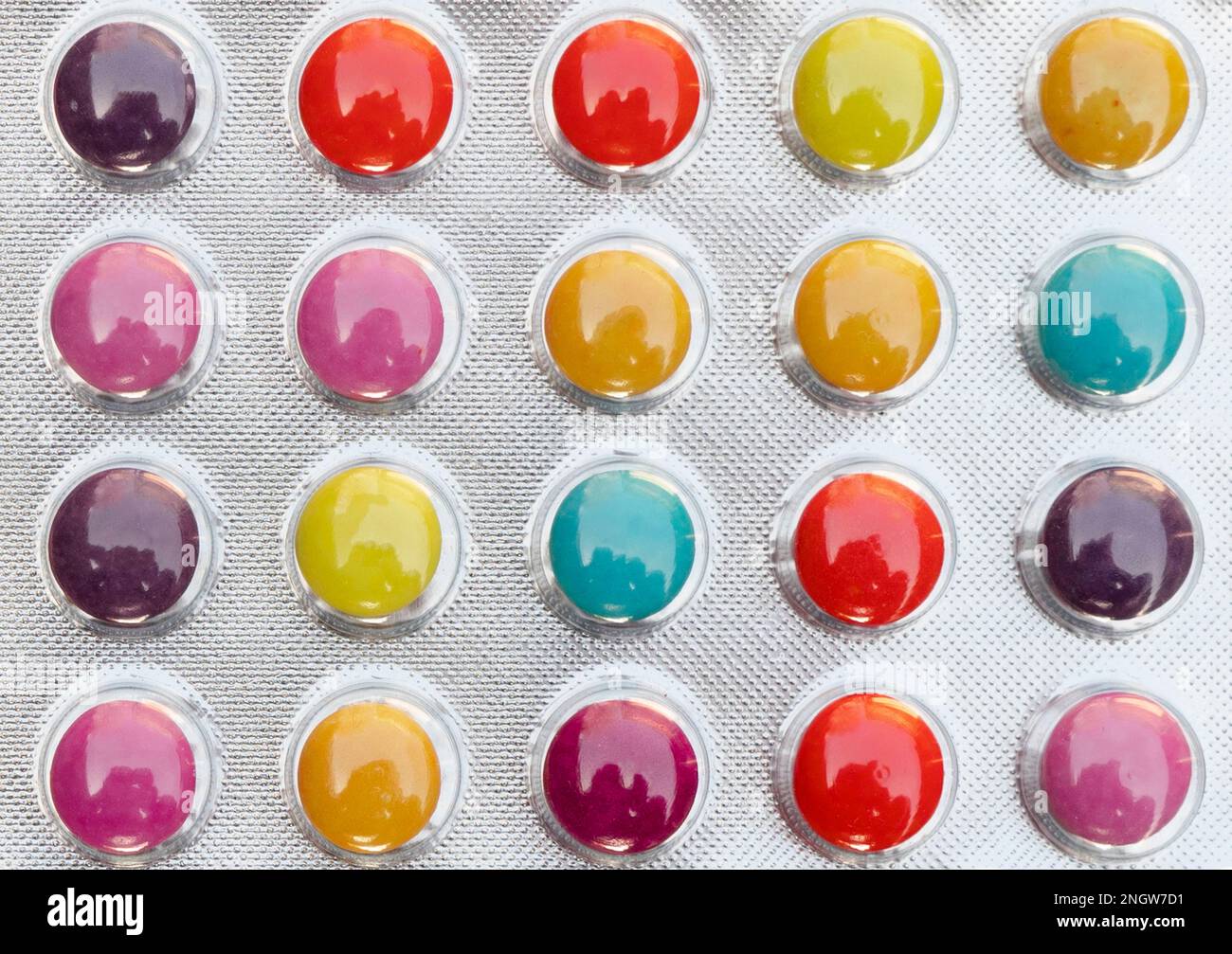 Candy in a blister package texture background. Cough drops in blister ...