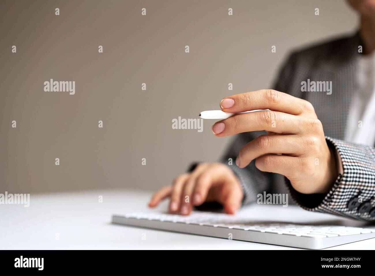 Digital pen stylus in woman hand, signing virtual documents, space for ...