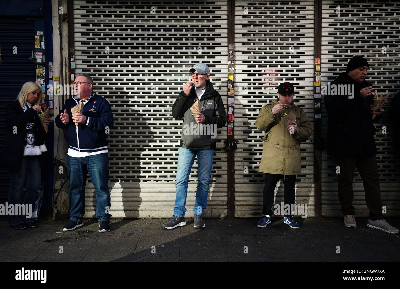 Fans eating chips ahead of the Premier League match at the Tottenham ...