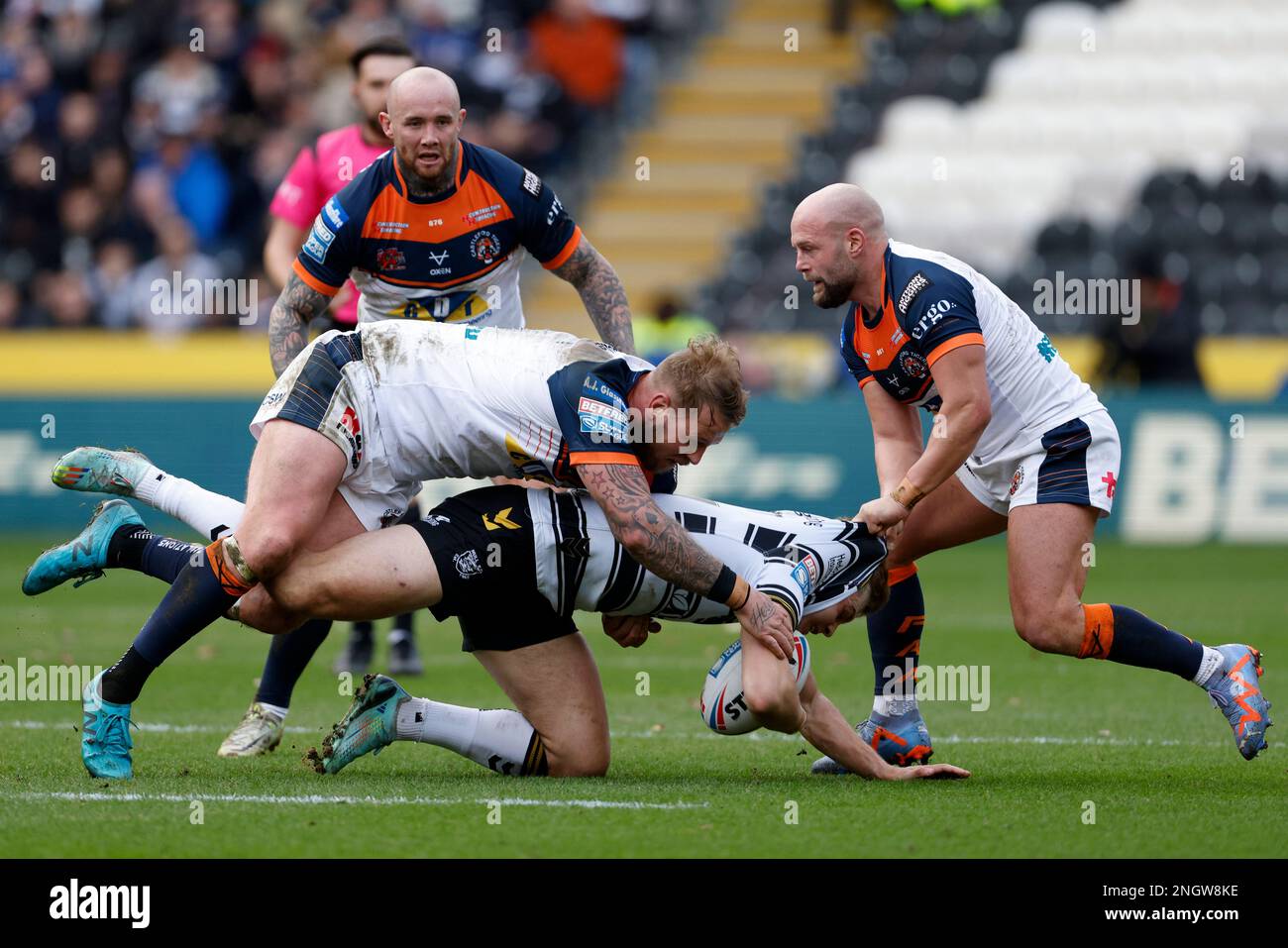 Castleford Tigers' Joe Westerman tackles Hull FC's Scott Taylor during ...