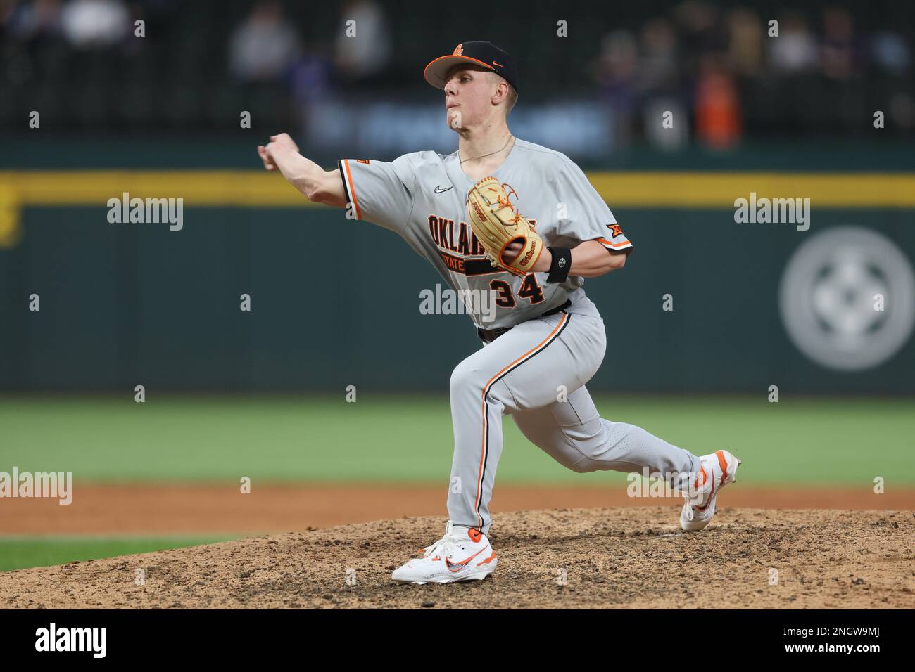February 18, 2023: Cowboys pitcher Isaac Stevens #34 brings a pitch ...