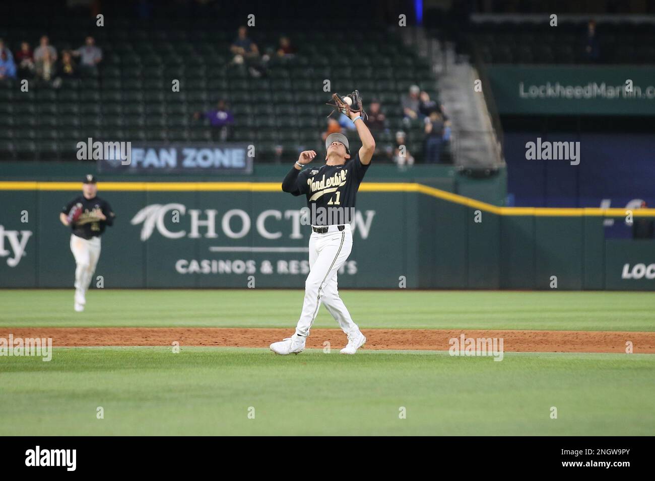 February 18, 2023: Commodore infielder Davis Diaz #11 settles under a ...