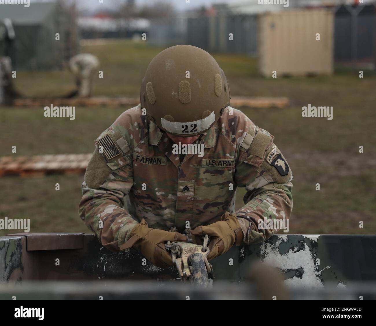 A Soldier from the 101st Airborne Division (Air Assault) inspects a ...